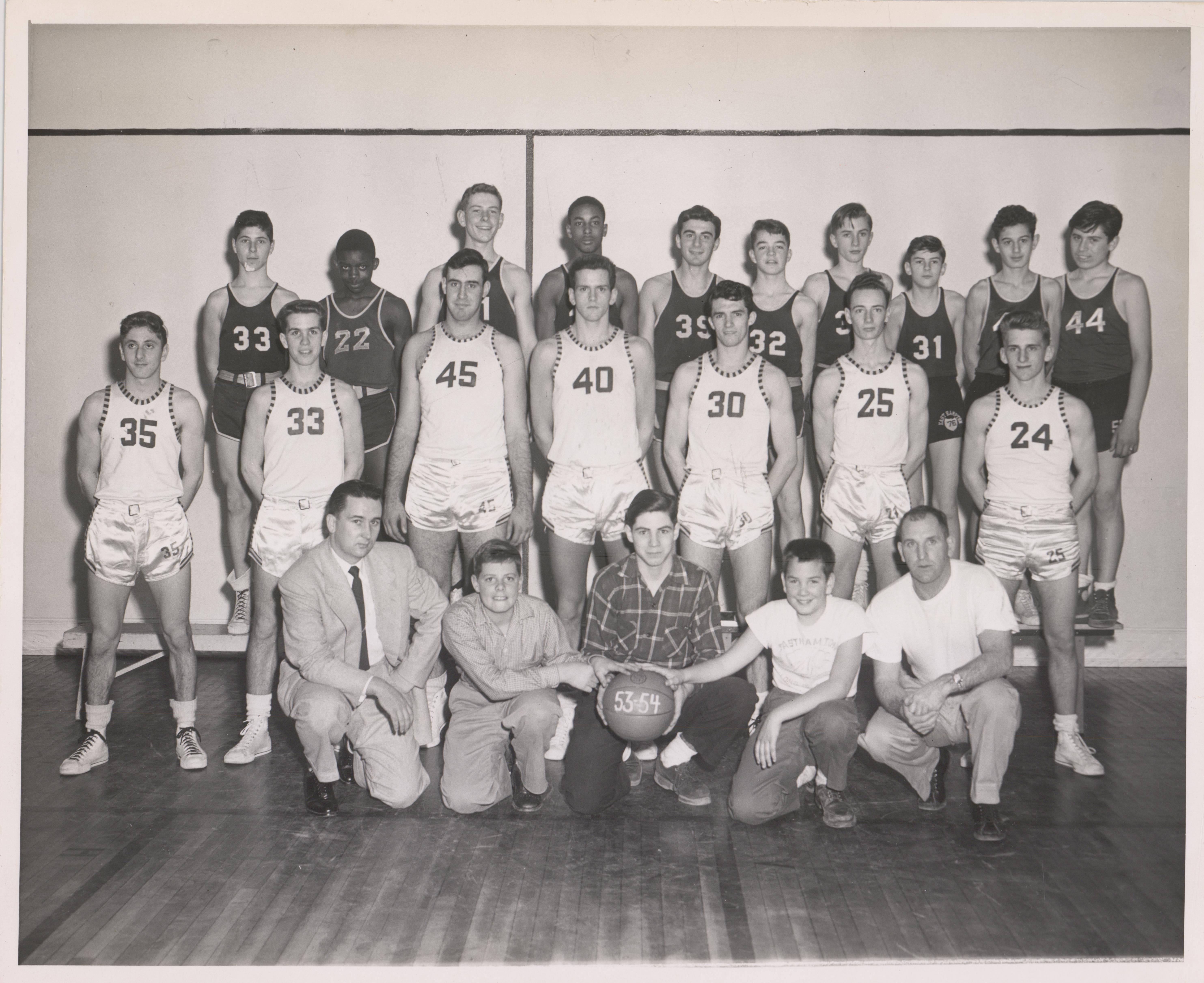 Coach Kiernan and Coach Carl Johansen with the 1953-1954 Basketball Team
