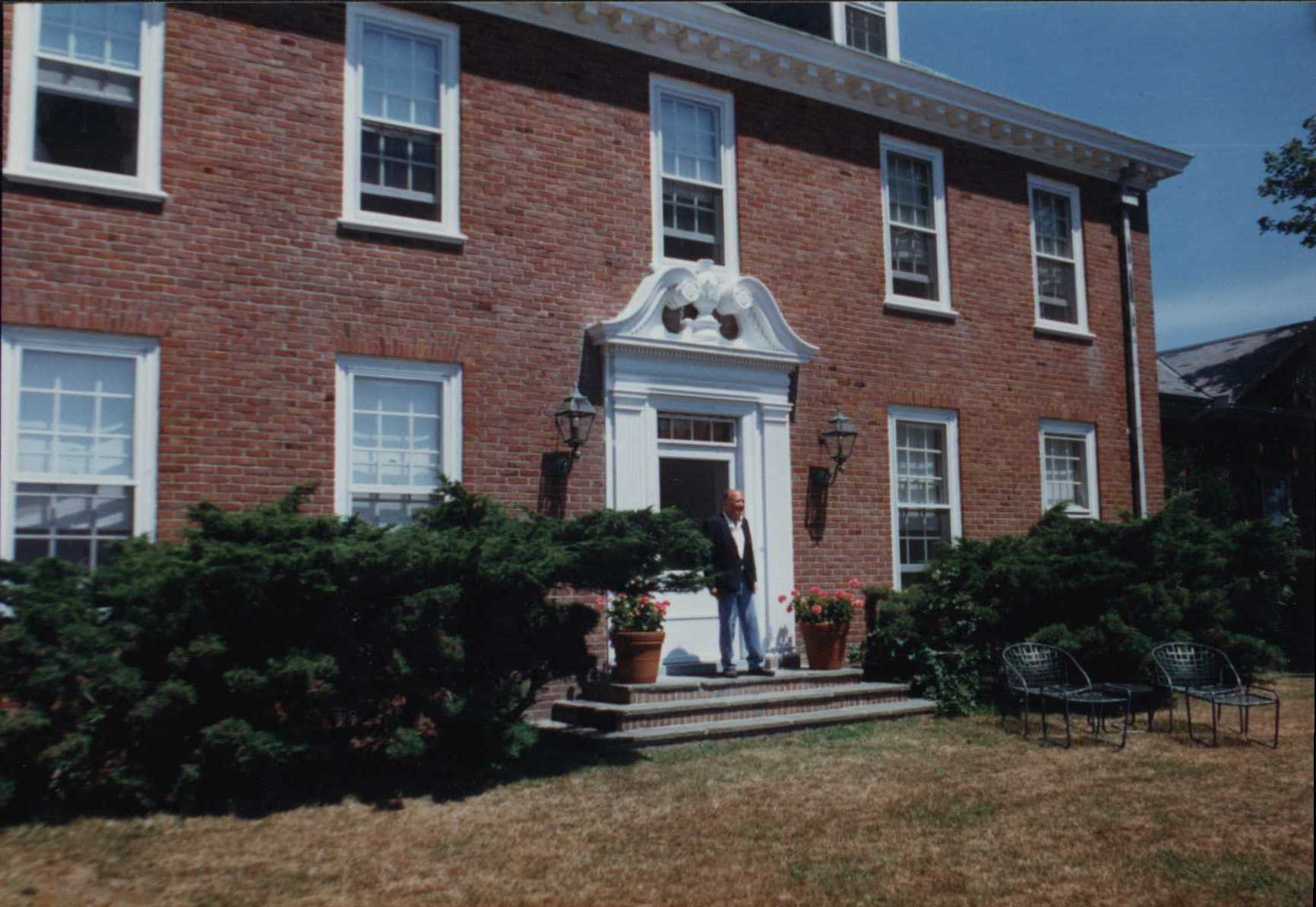 Robert D. L. Gardiner in front of Gardiner's Island Manor House